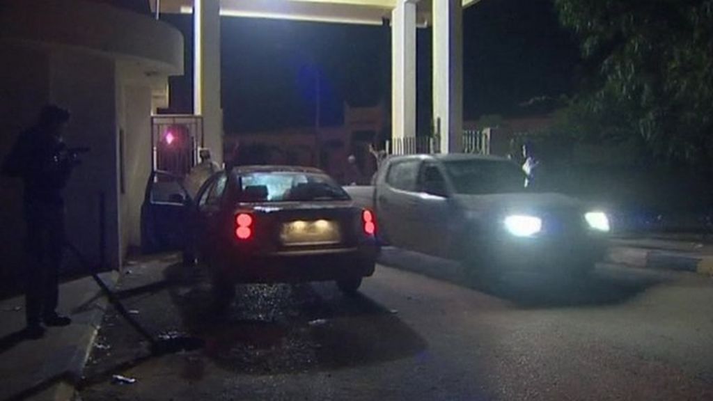 Col Gaddafi 'buried in secret, desert grave at dawn' - BBC News