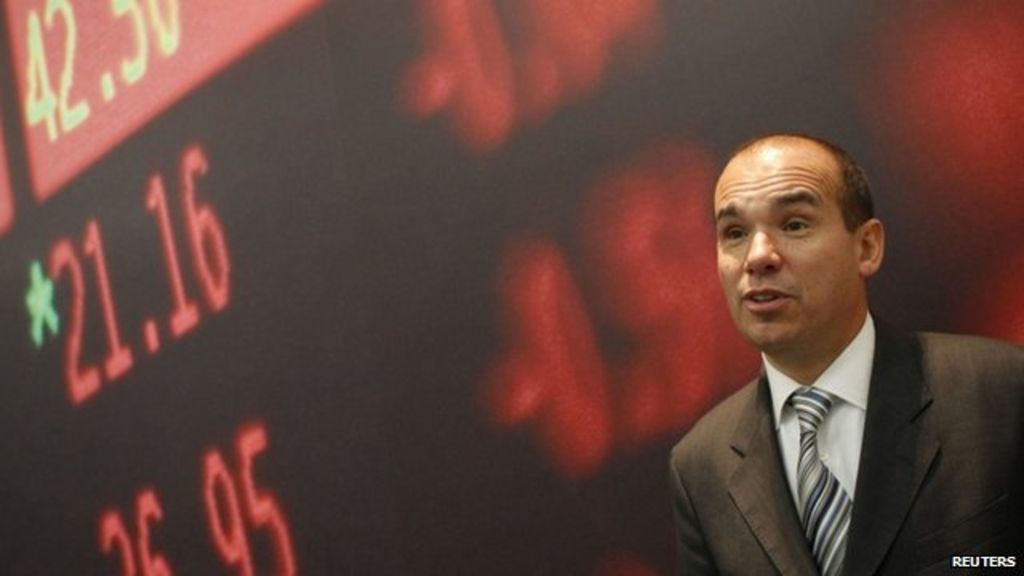 Olympus submits earnings to try to avoid delisting - BBC News