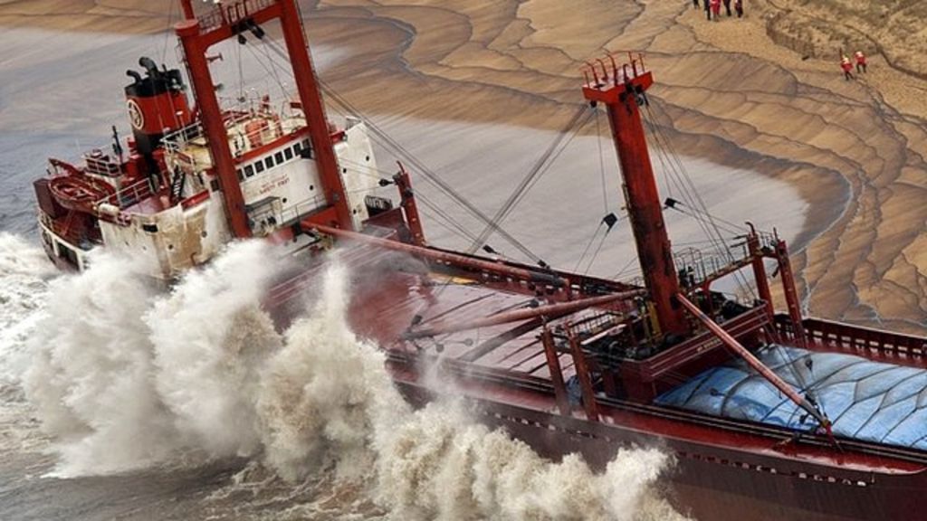 Cargo ship crew rescued off Brittany coast in France - BBC News
