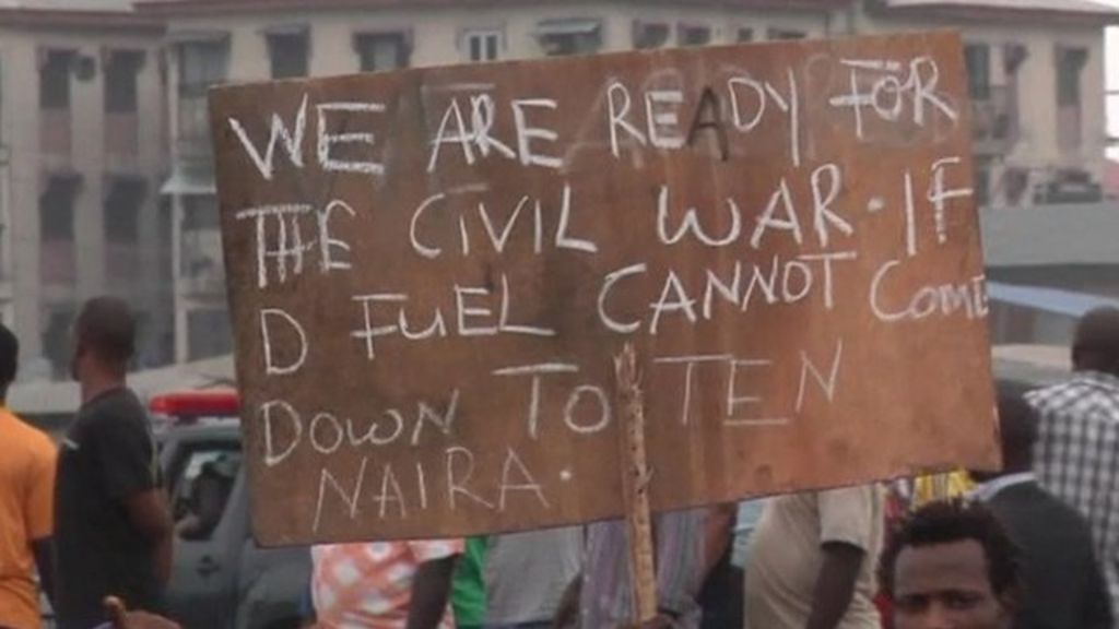 Nigerian strike suspended as cut in price of petrol agreed - BBC News