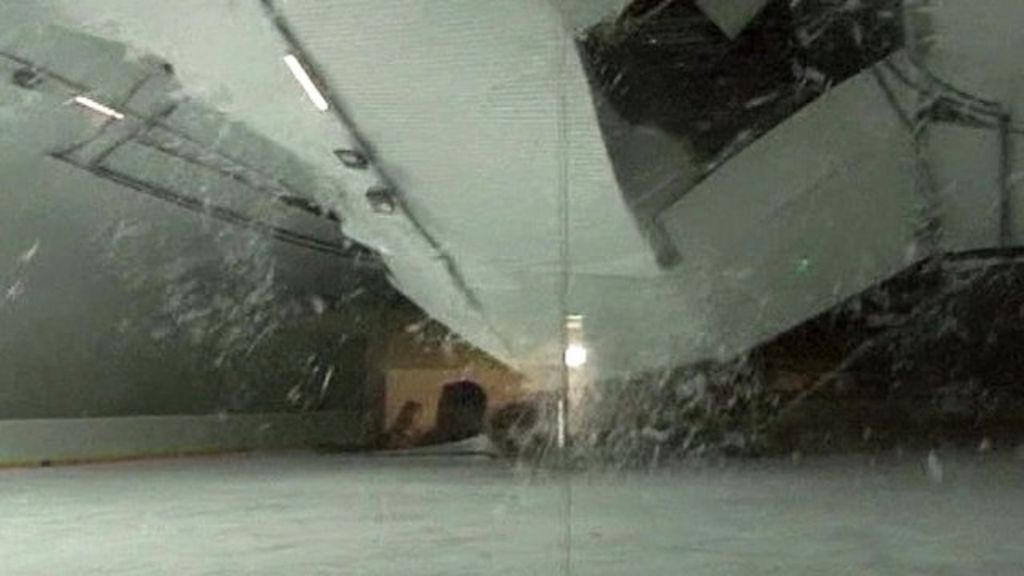 Ice rink roof in Slovakia caves in under weight of snow - BBC News