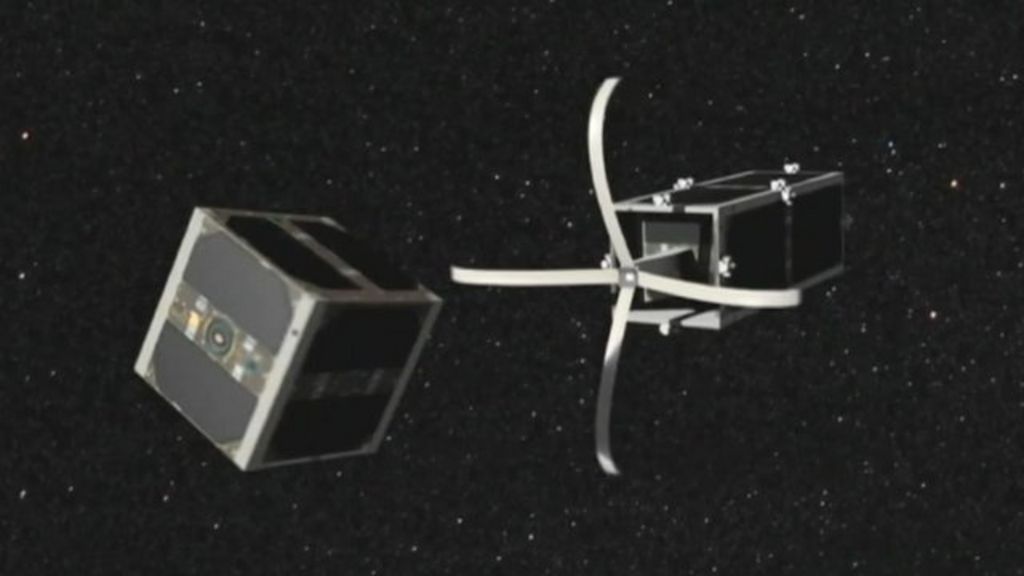 Swiss to launch space junk cleaning device - BBC News