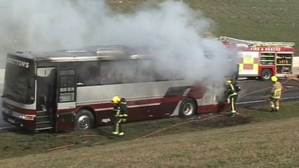 Coach fire pupils led to safety - BBC News