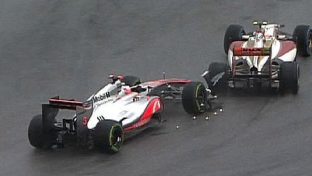 Jenson Button's Malaysian Grand Prix ruined after crash - BBC Sport
