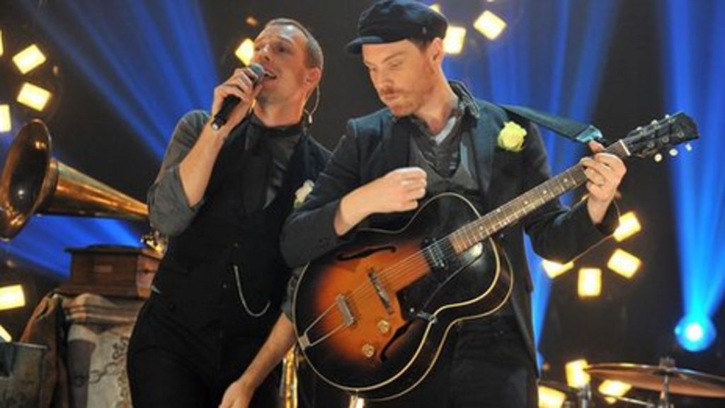 Jonny Buckland gives Coldplay disc to Pantymwyn village hall ...