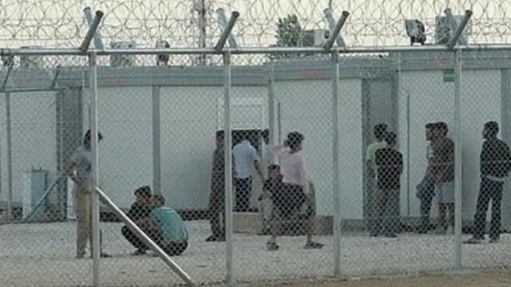 Greece opens detention centre for illegal migrants - BBC News