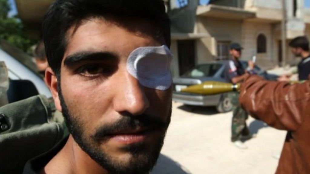 Battle for Syrian town of Rastan continues despite ceasefire - BBC News