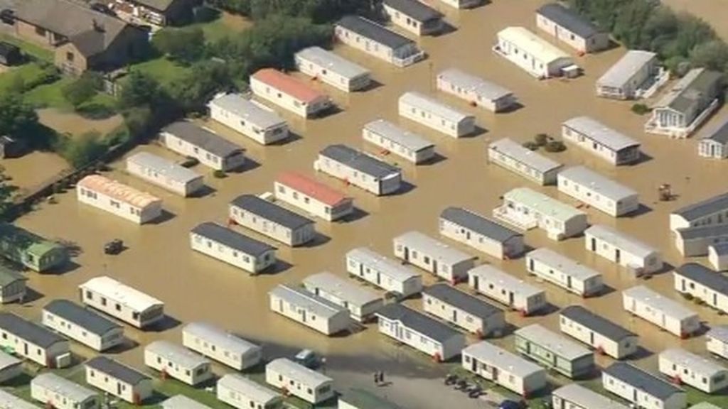 Aerial shots of flood aftermath in Wales - BBC News