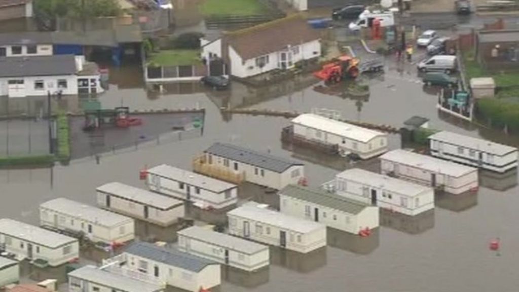Aerial footage of West Sussex floods - BBC News
