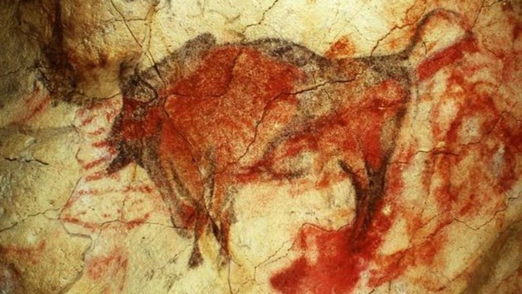 Red dot becomes 'oldest cave art' - BBC News