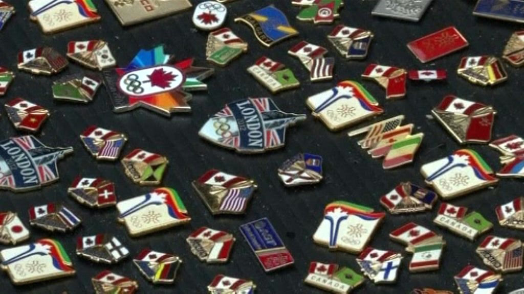 Pin collectors look for the ultimate swap at Olympic Park - BBC News