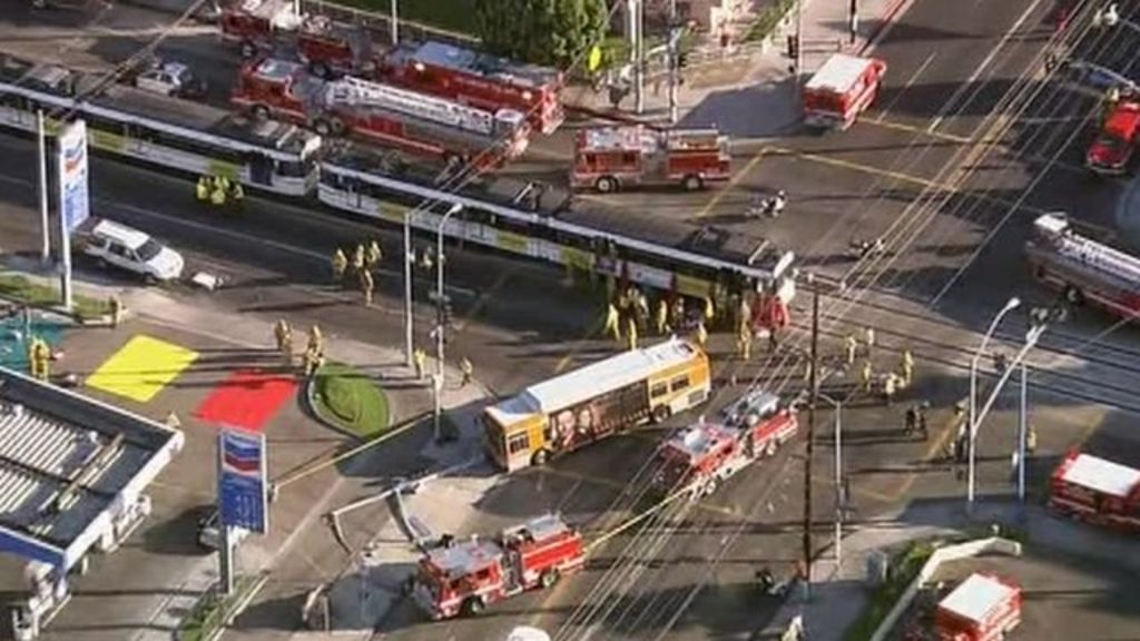 Los Angeles bus and train crash injures dozens - BBC News