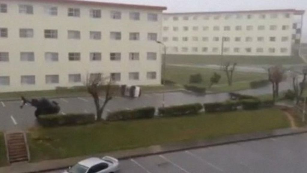 Car gets flipped in typhoon - BBC Newsround