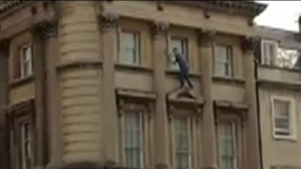 Window cleaner working without ladder sparks safety concerns - BBC News