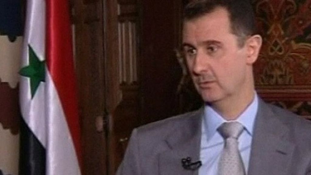 Syrian president Bashar al-Assad: 'I will not flee my country' - BBC News