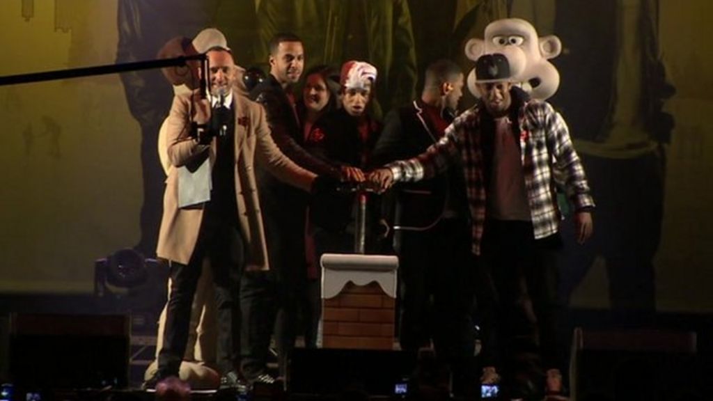 JLS turn on Christmas lights at Cribbs Causeway - BBC News
