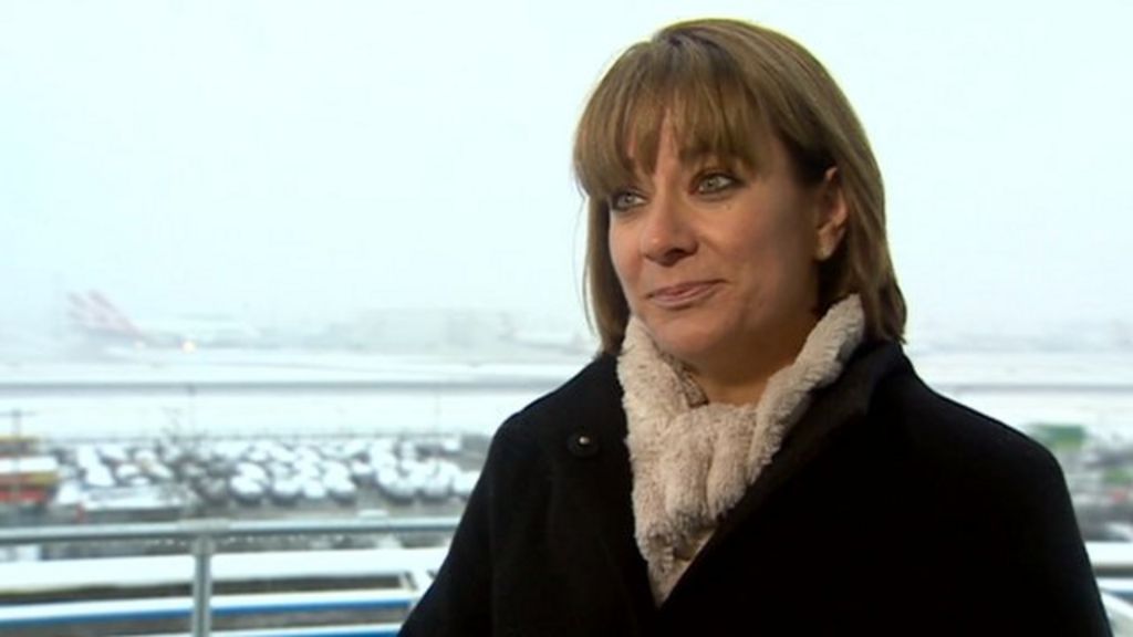 Snow causes more flight delays - BBC News