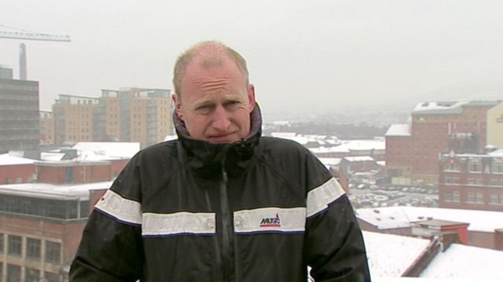 Snow reporter Andy Martin braves Northern Ireland hail - BBC News