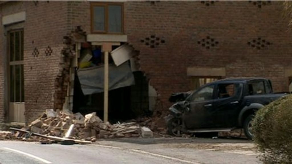 Police chase car crashes into Lancashire house - BBC News