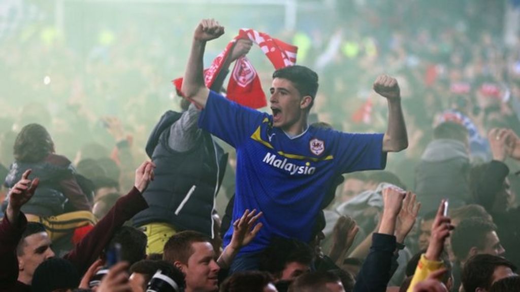 Cardiff City fans celebrate promotion to Premier League - BBC News