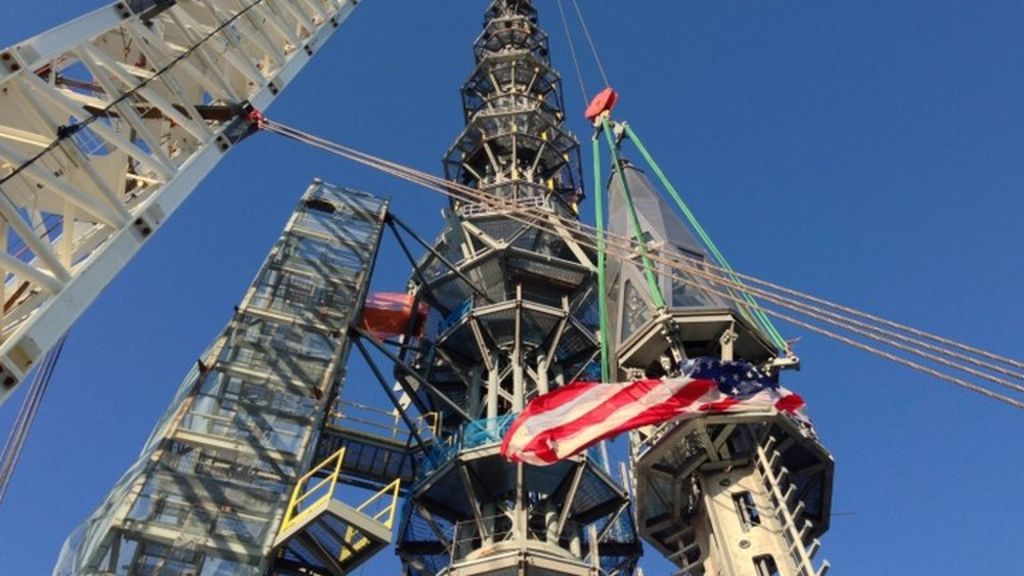 One World Trade Center spire installed in New York City - BBC News