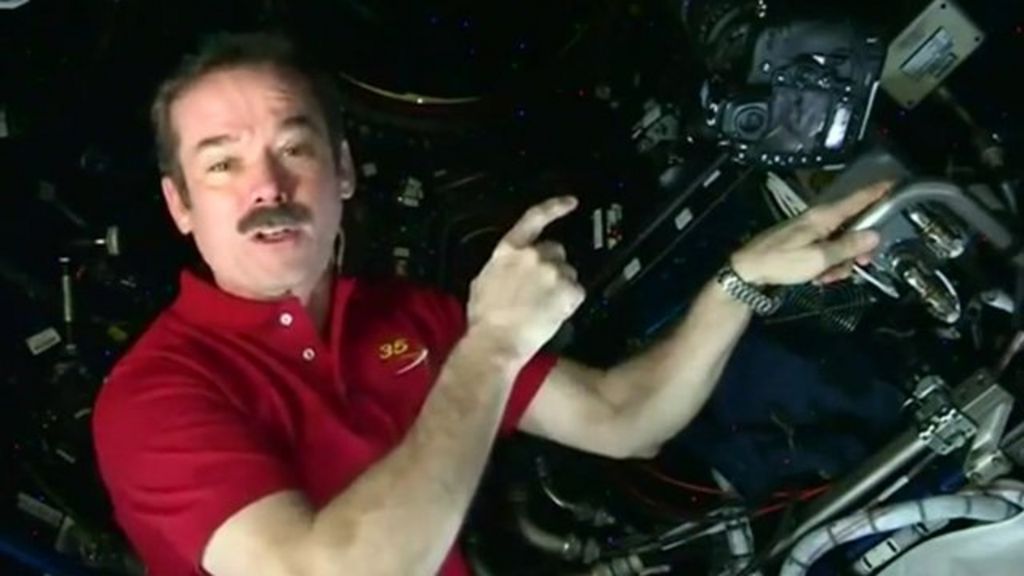 ISS Commander and 'star' Chris Hadfield back on Earth - BBC News