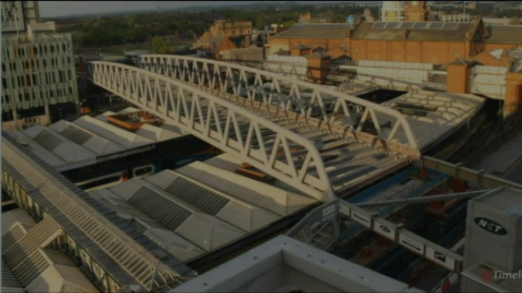 Nottingham tram bridge inched into place - BBC News