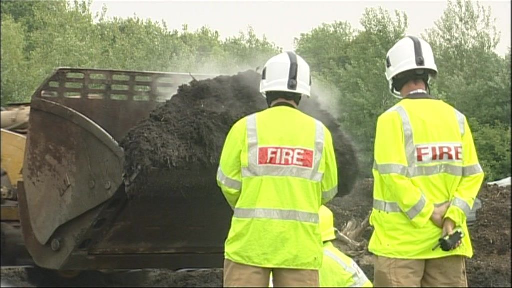 Compost fire legal action threat - BBC News