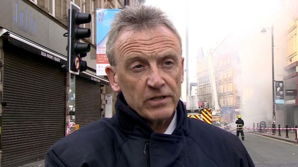 Manchester fire crews 'devastated' at fireman's death - BBC News