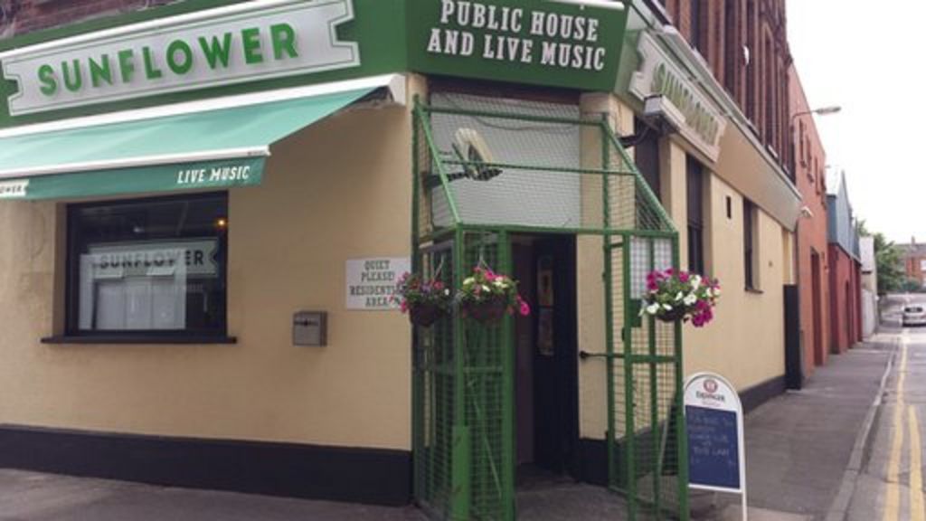 Belfast's Sunflower bar wants to keep cage - BBC News