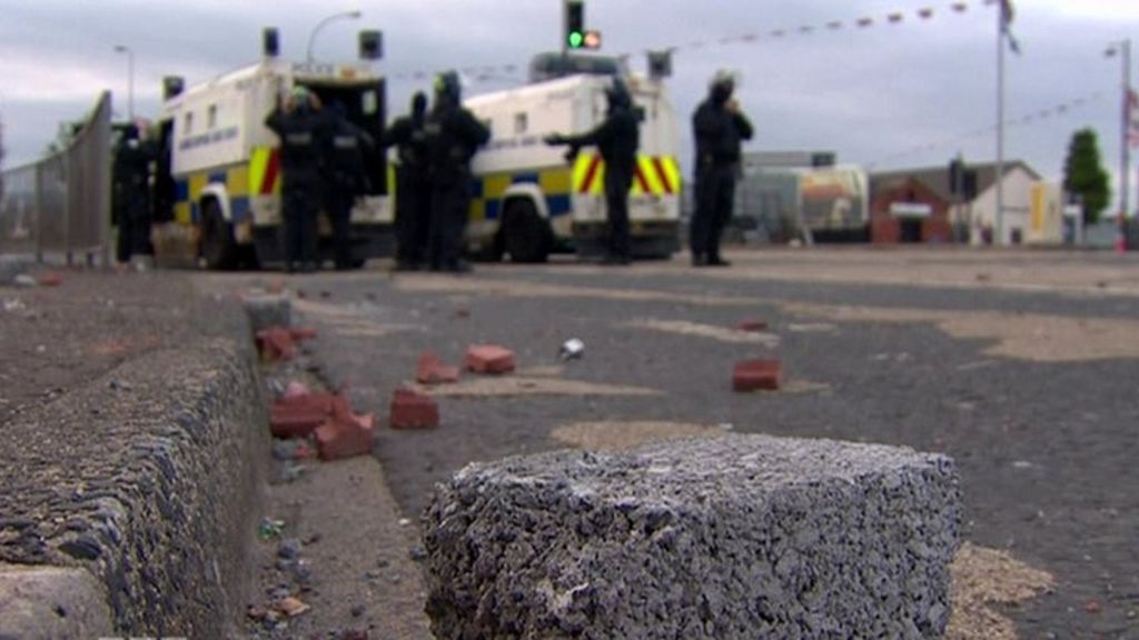 Blast bombs and petrol bombs thrown at police in Belfast - BBC News