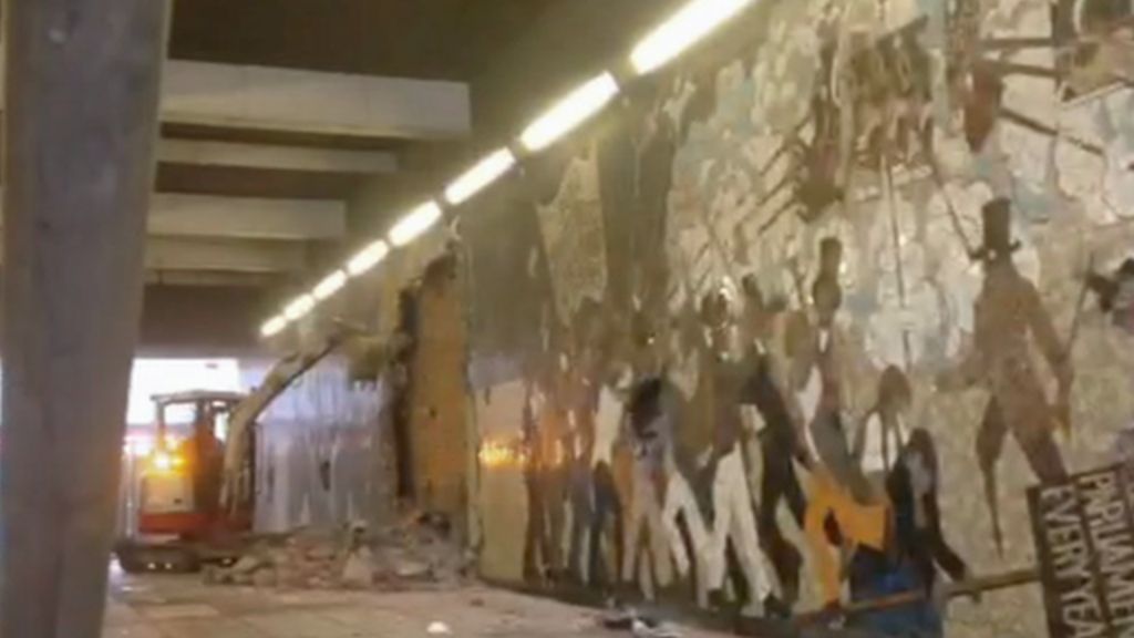Protest as Newport's Chartist mural demolition starts - BBC News