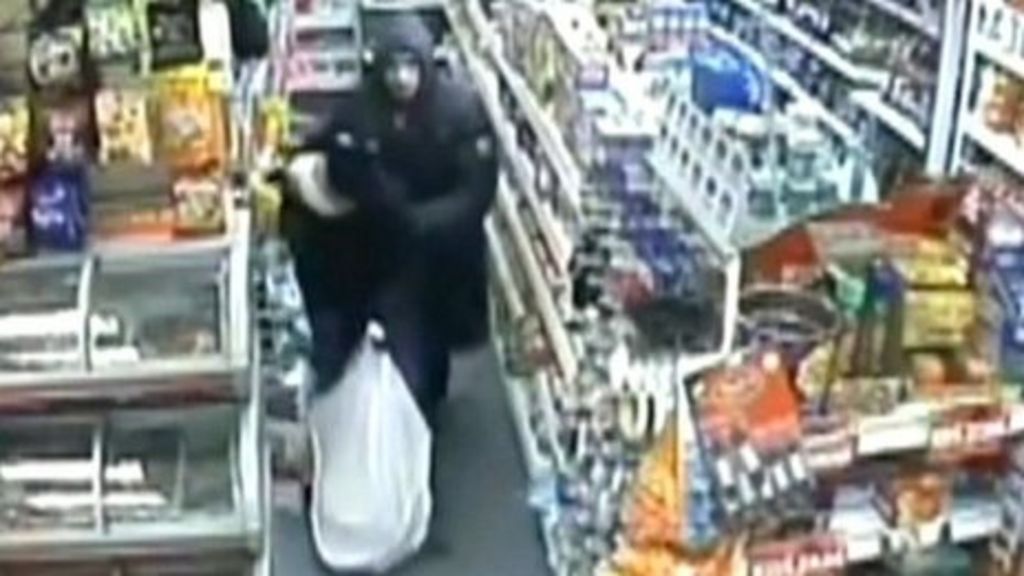 Robbers caught on CCTV jailed after mother calls police - BBC News