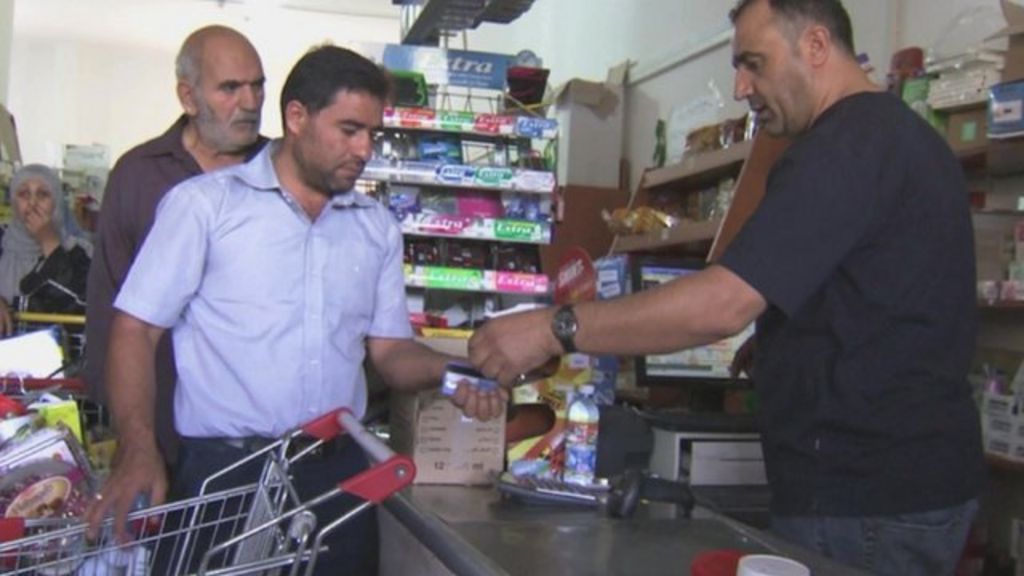 Payment cards to help Syrian refugees and local economies - BBC News