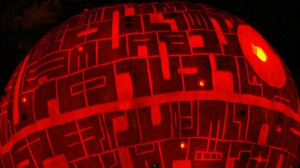 Halloween artist carves pumpkins into the Death Star - BBC News