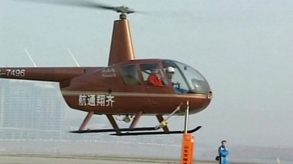 Sledgehammer to crack a nut? Helicopter skid opens a beer - BBC News