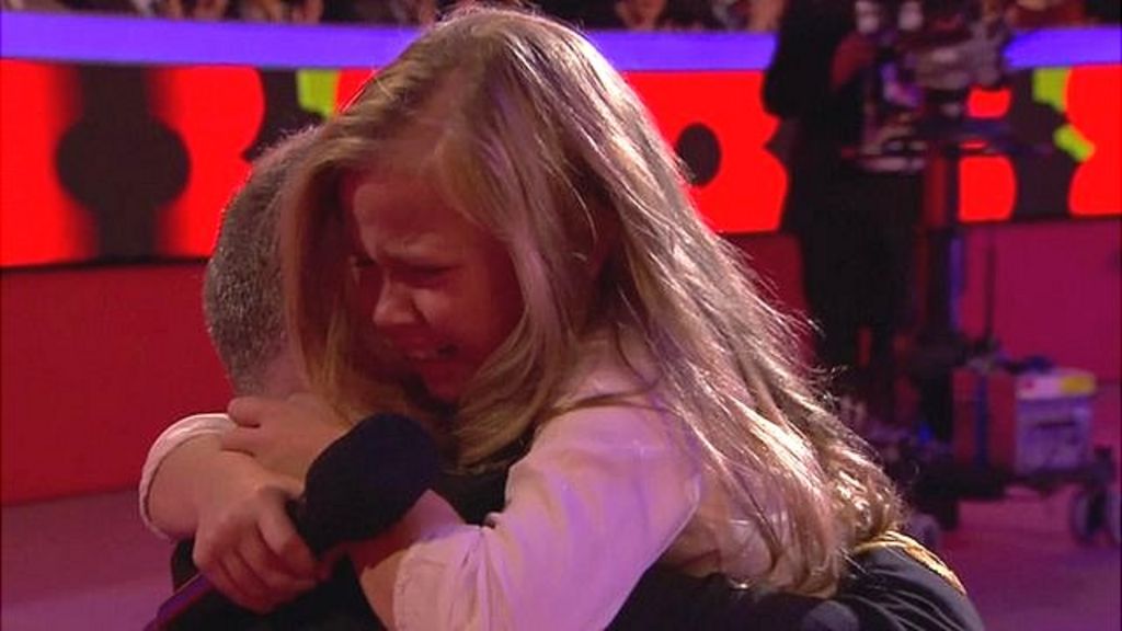 Poppy girl emotional reunion with her Royal Navy father - BBC News