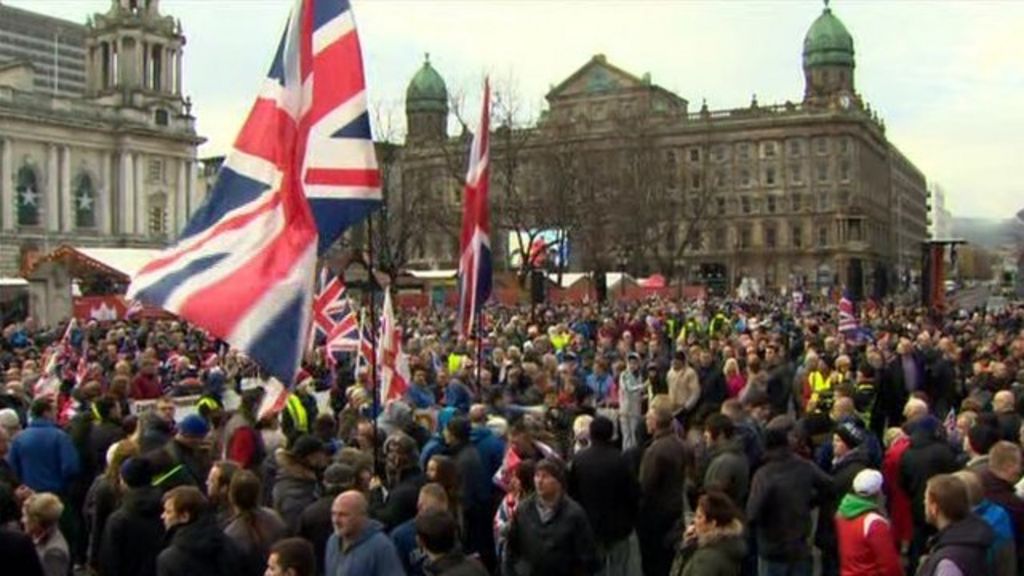 Police injured during loyalist protest march in Belfast - BBC News