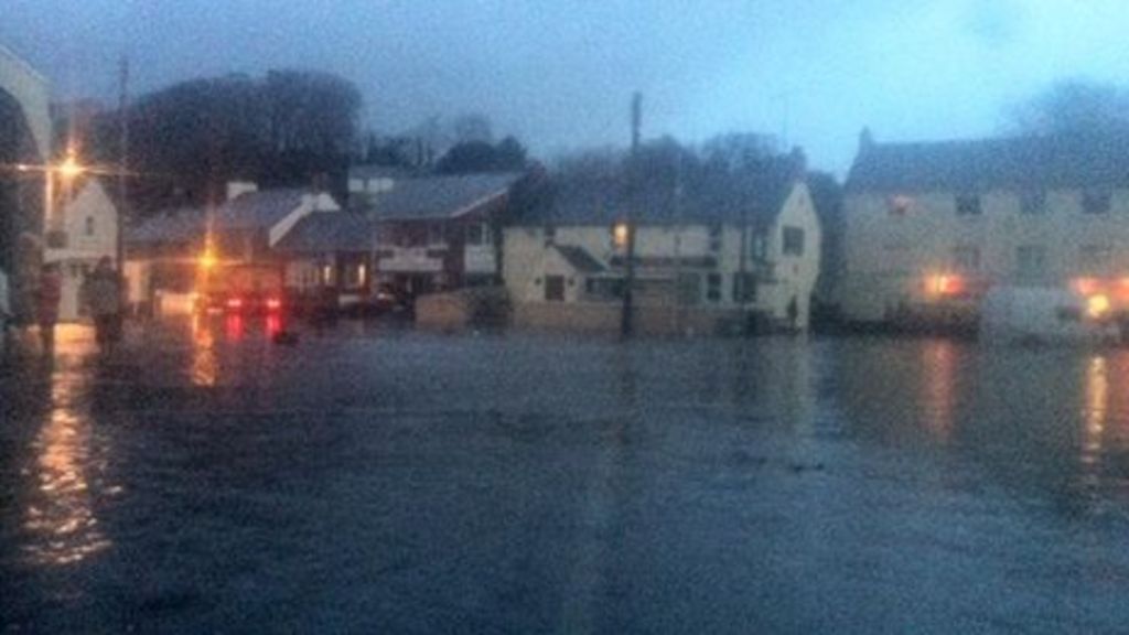 Storm surge brings flooding chaos moving up Wales' coast - BBC News