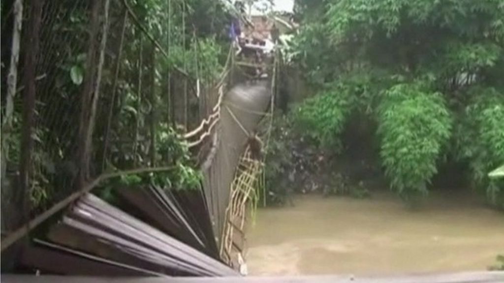 Two dead and others missing in Indonesia bridge collapse - BBC News