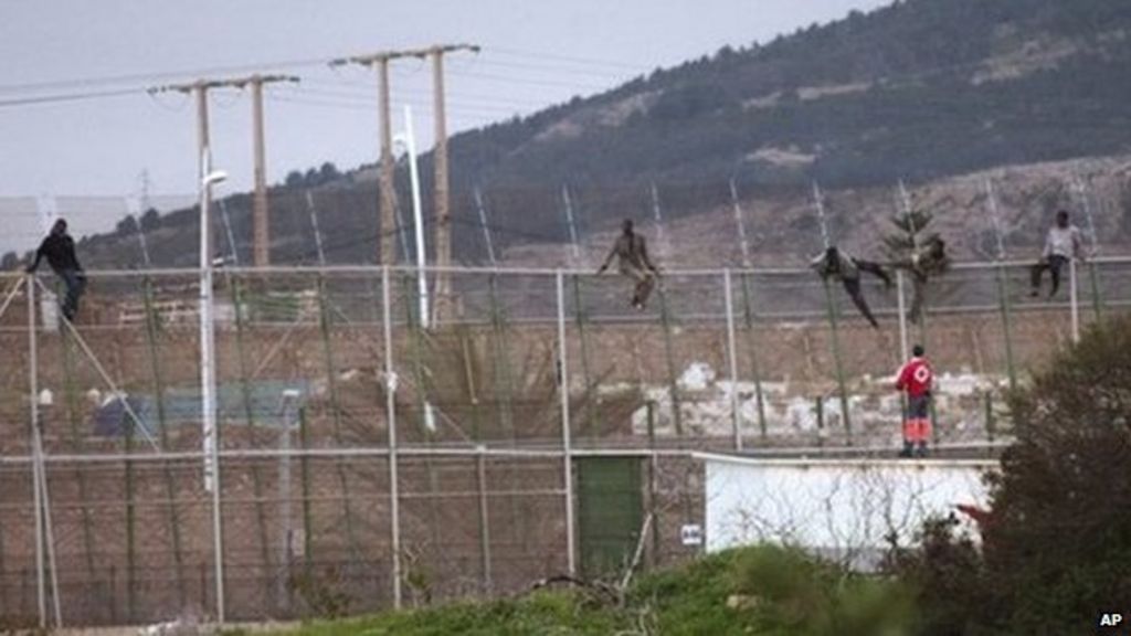 African migrants 'storm' Spain's Melilla-Morocco border - BBC News