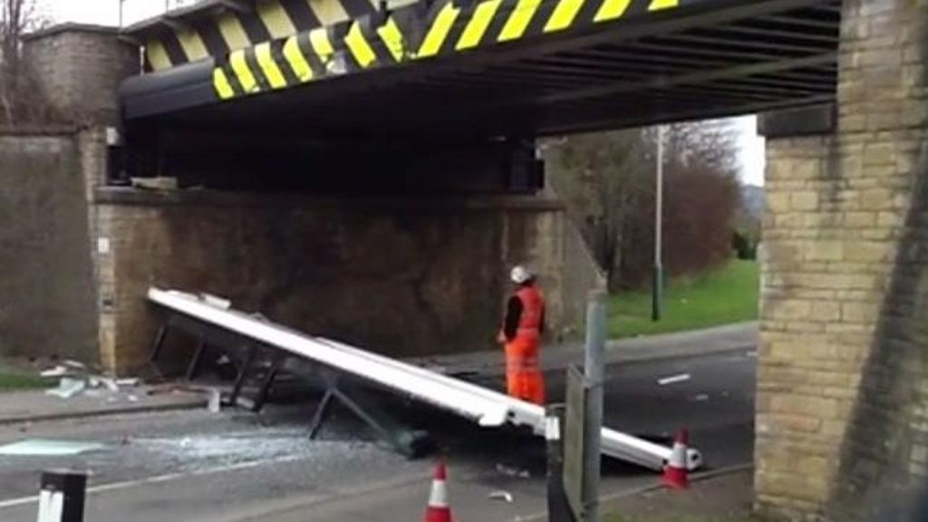 Double-decker bus damages bridge in Cheltenham - BBC News