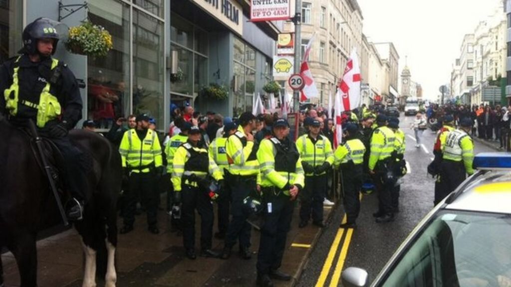 Three charged after Brighton March for England - BBC News