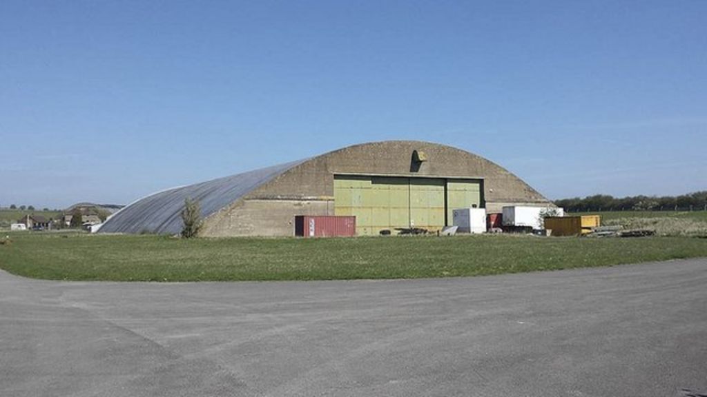 Two World War 2 hangars near Swindon sell for more than £1m - BBC News