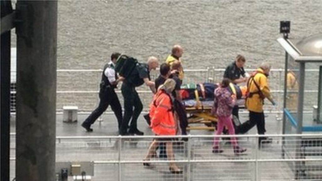 Nine injured as boat hits Tower Bridge - BBC News