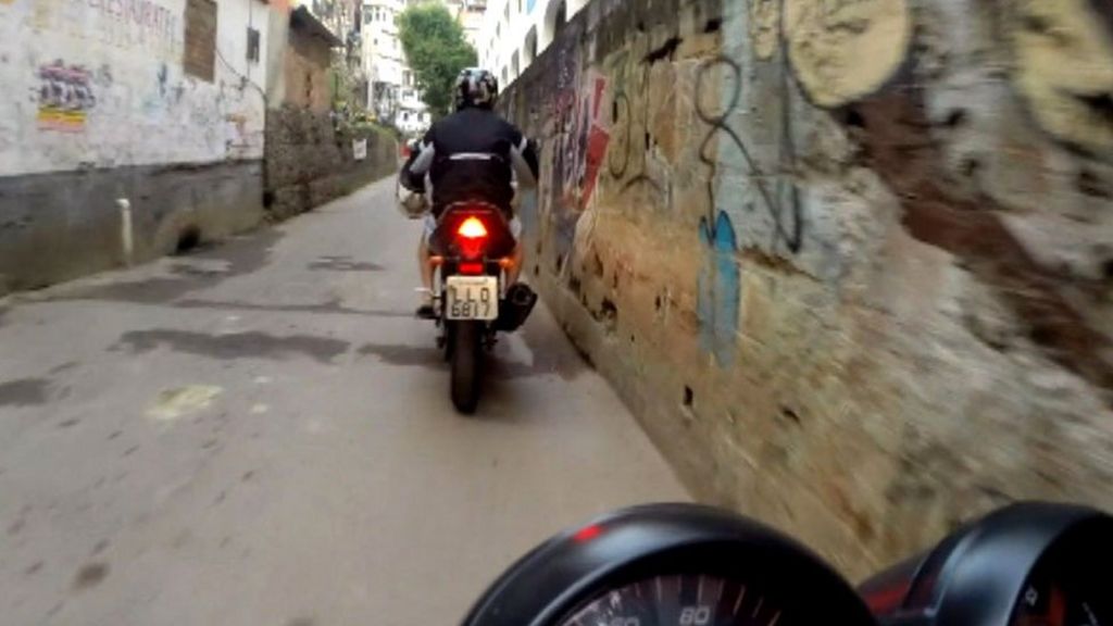 Rio motorbike ride through favela backstreets - BBC News
