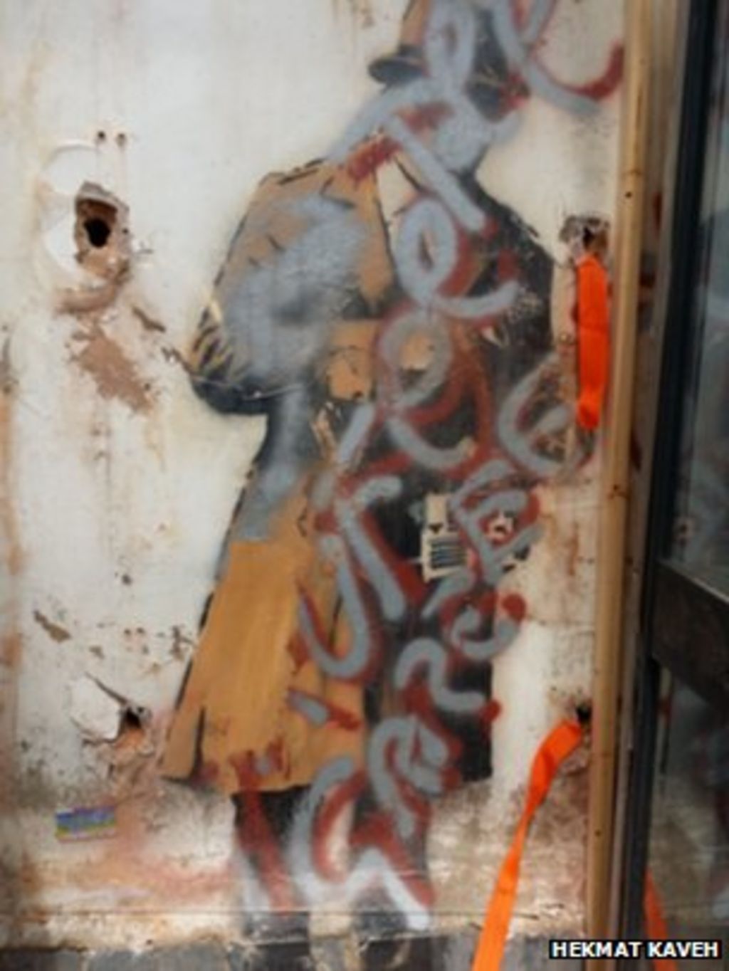 Cheltenham Banksy 'Spy Booth' artwork damaged again - BBC News