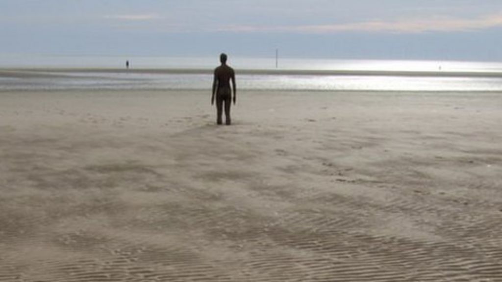 Woman waist deep in mud in Crosby Beach rescued - BBC News