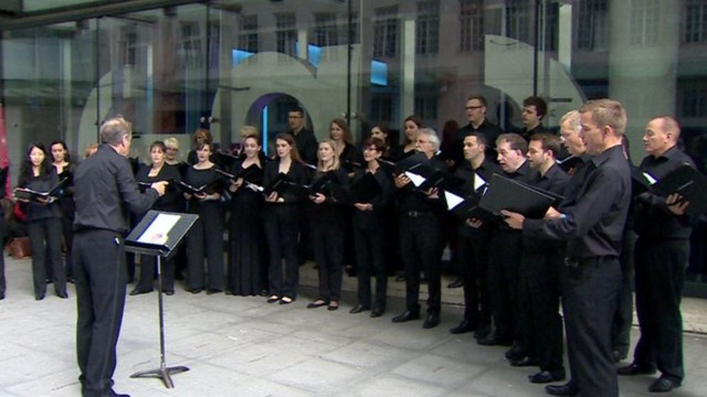 Choirs sing together for World Peace Day - BBC News