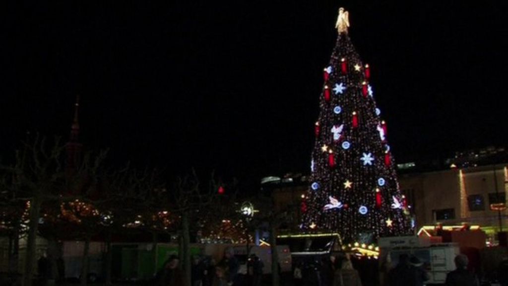 Giant Christmas tree lights up Dortmund in Germany - BBC Newsround